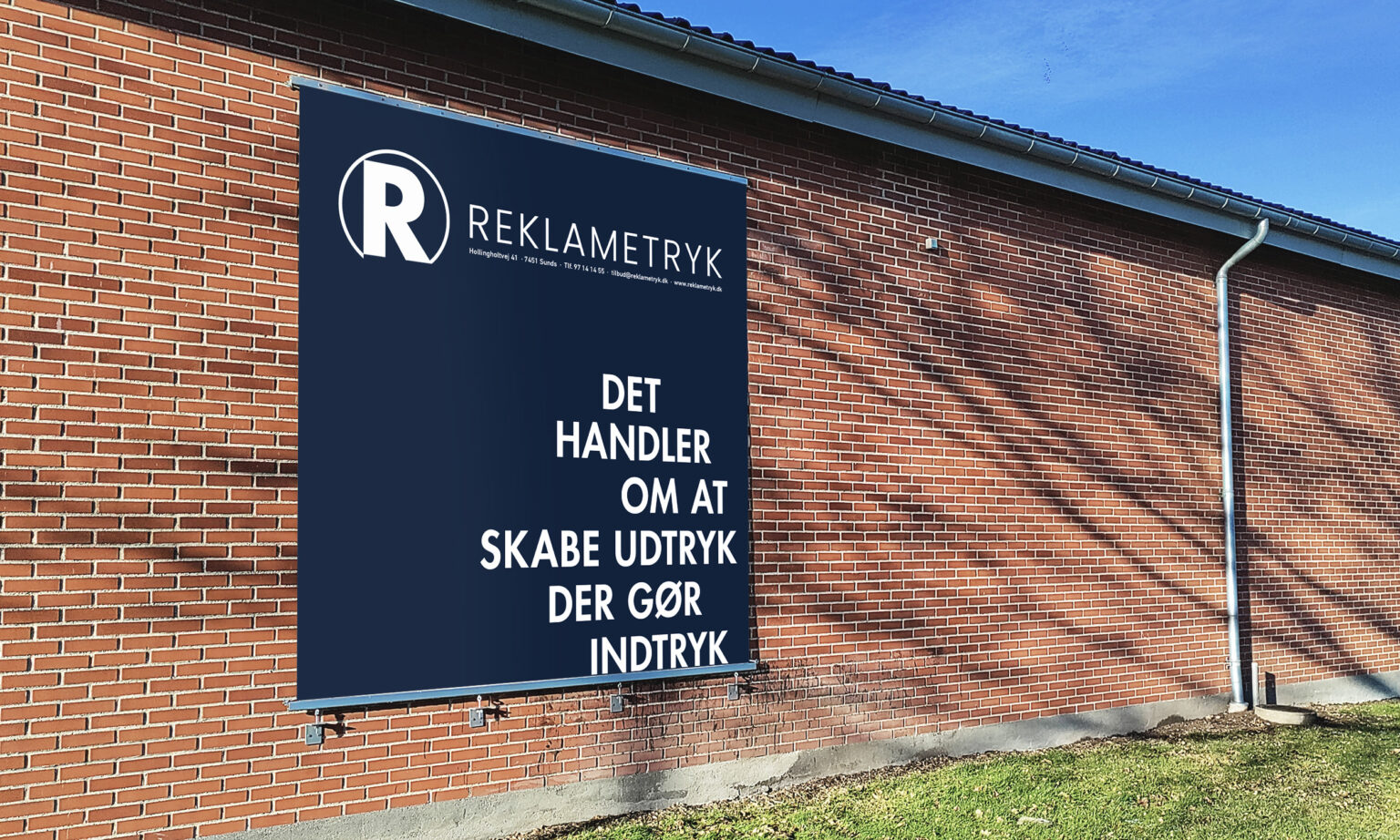 Banner med tryk til facade, stillads eller messe · ReklameTryk